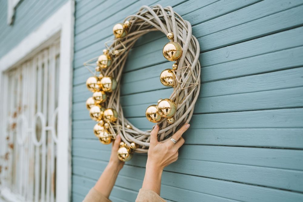 How To Hang Holiday Decorations Without Damaging Your Home